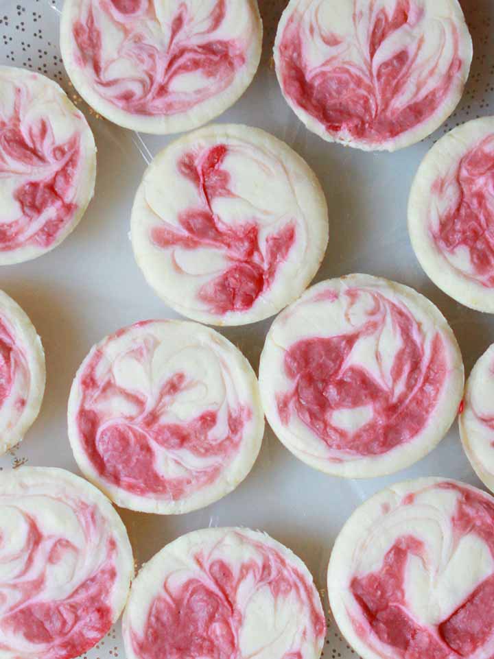 Keto Raspberry Swirl Mini Cheesecakes - Resolution Eats